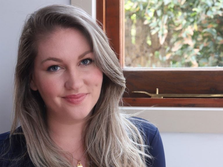 Who is the team behind Woof Media?